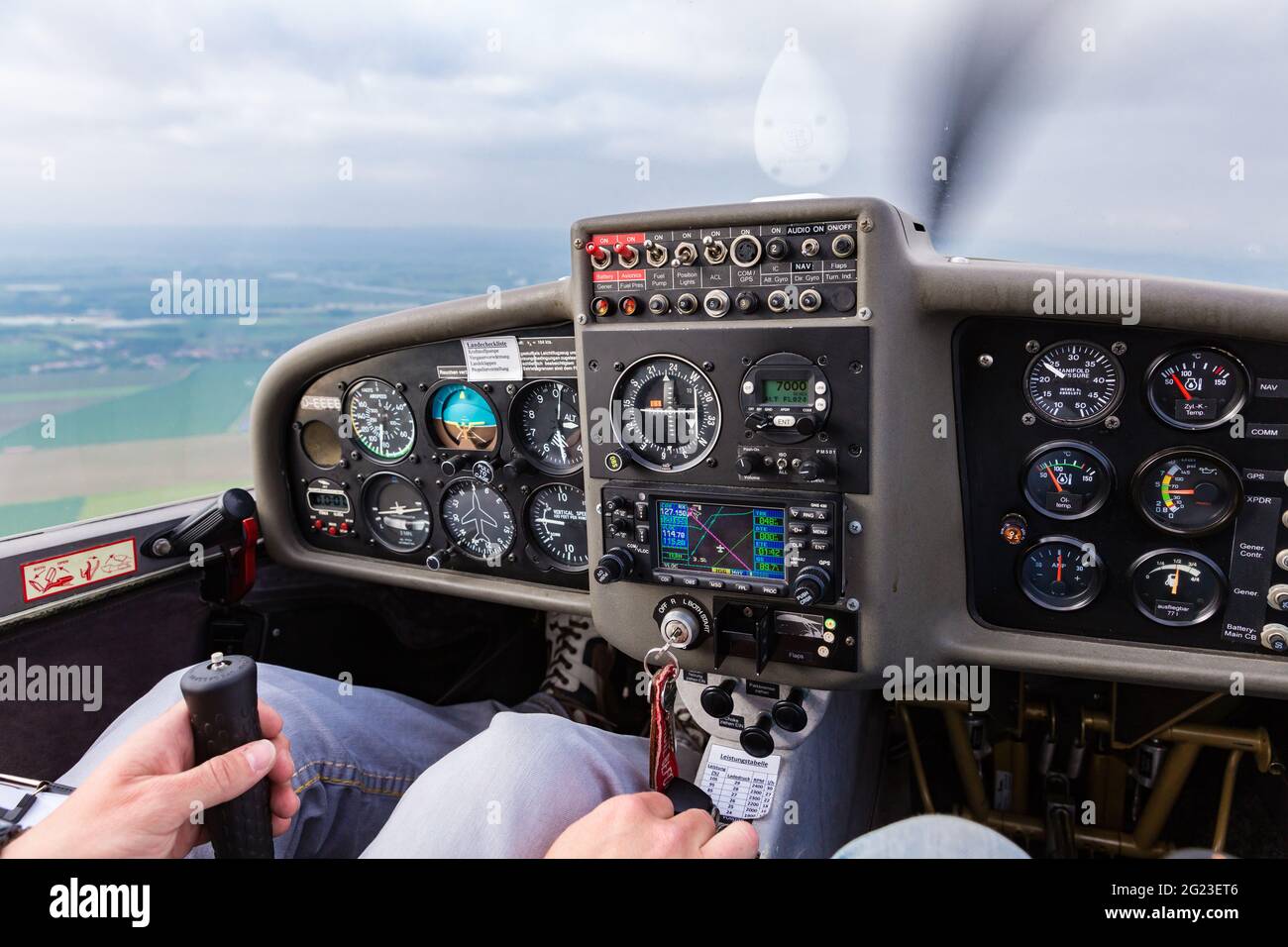 Pilot flying a private sport airplane using the steering stick Stock ...