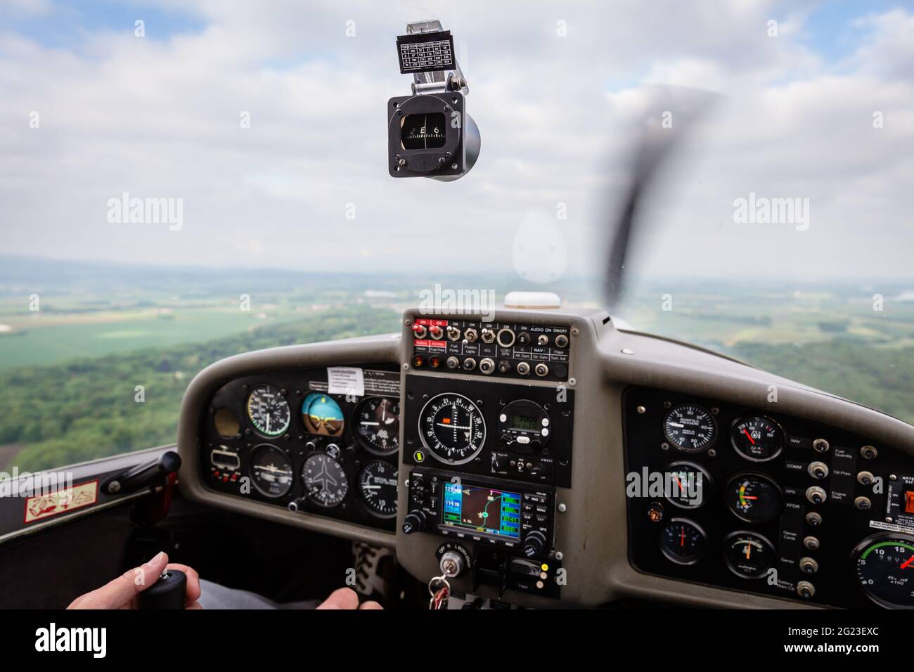 Pilot flying a private sport airplane using the steering stick Stock ...