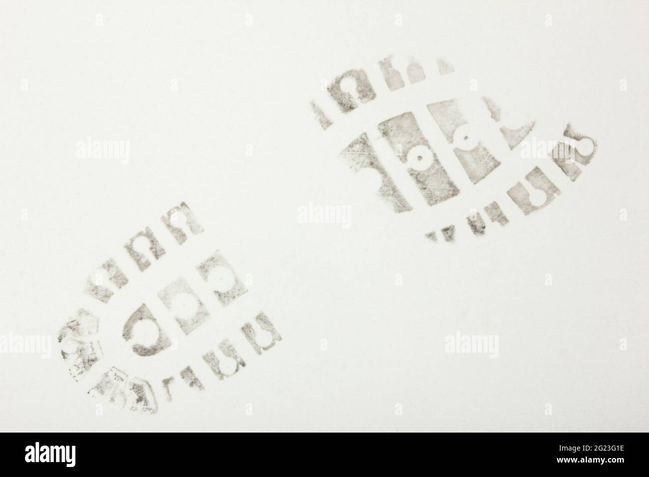 shoe print on a white background Stock Photo - Alamy