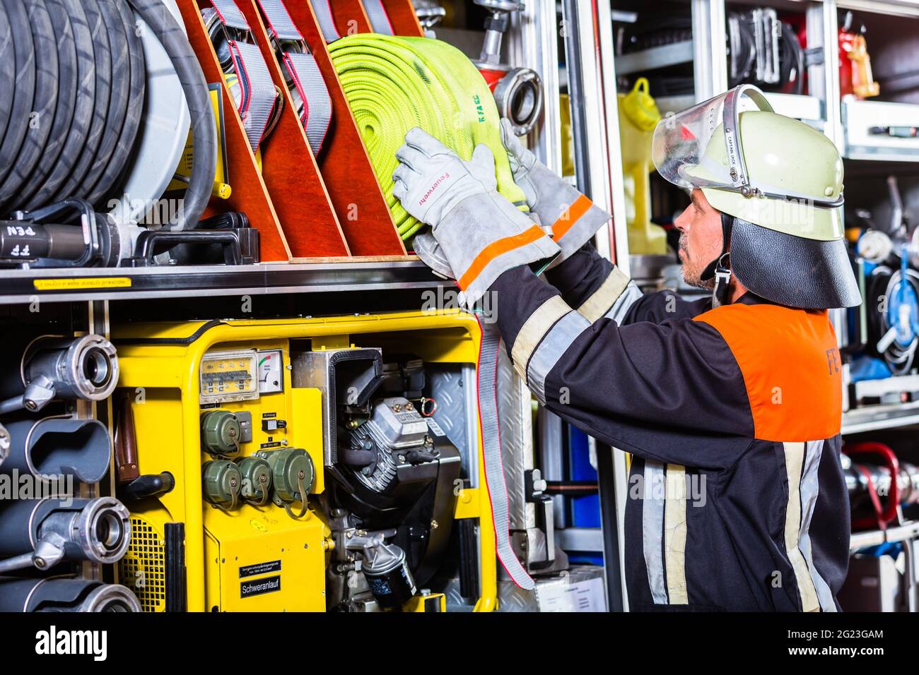 Fire department brigade action water hose hoses hi-res stock ...