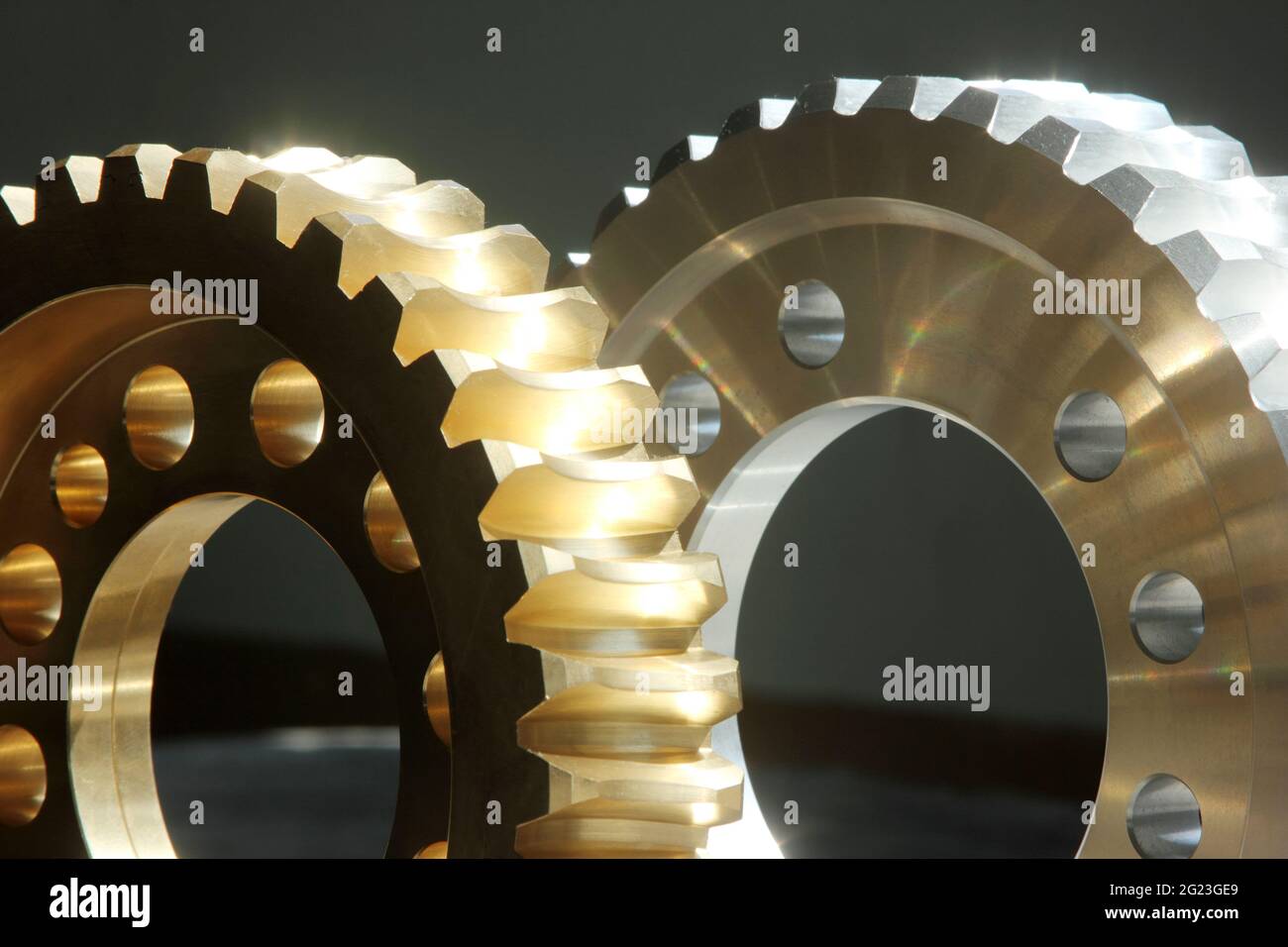 Gear wheels studio shoot industrial background Stock Photo - Alamy