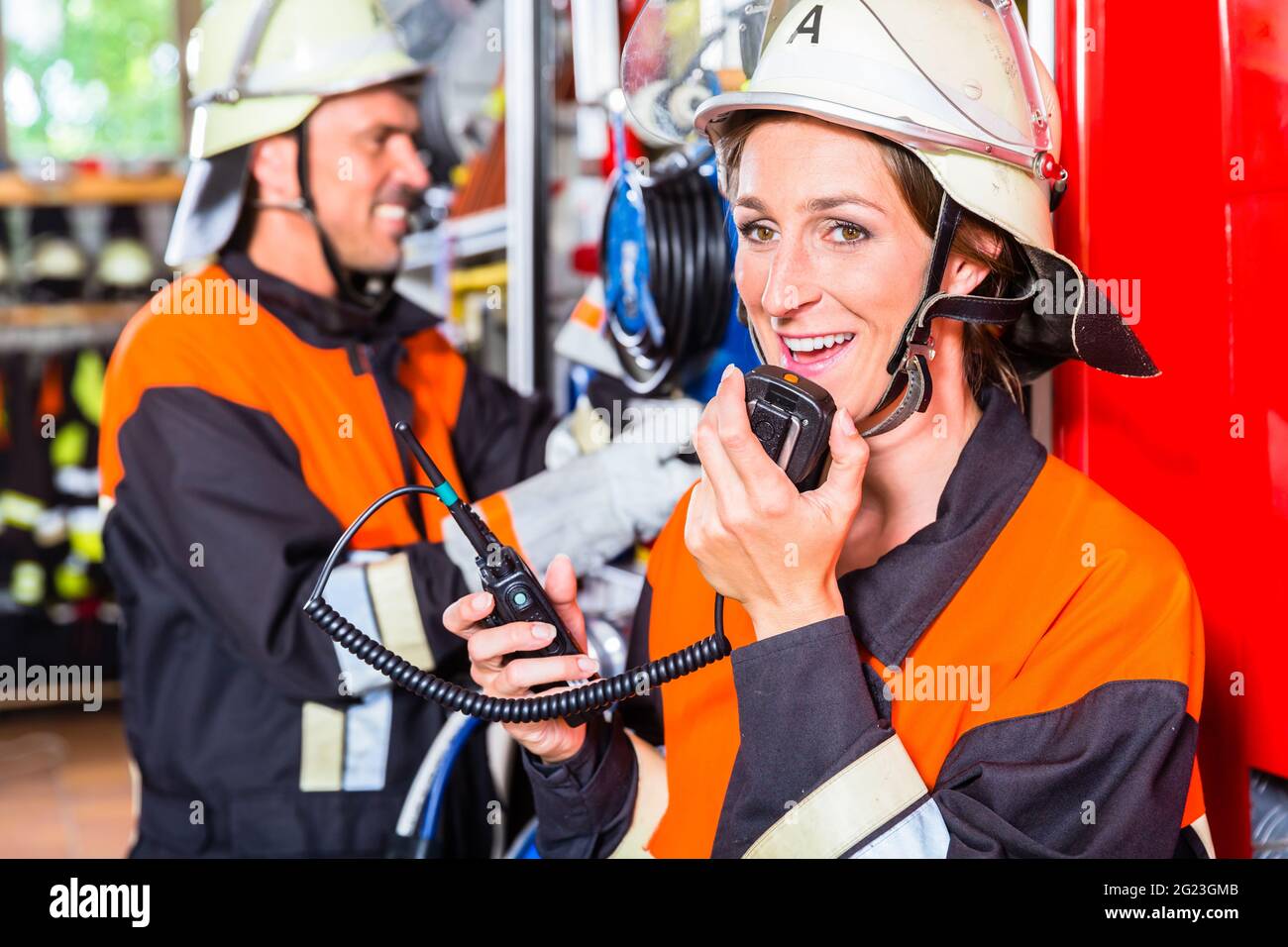 Chief of fire department checking radio connection Stock Photo - Alamy