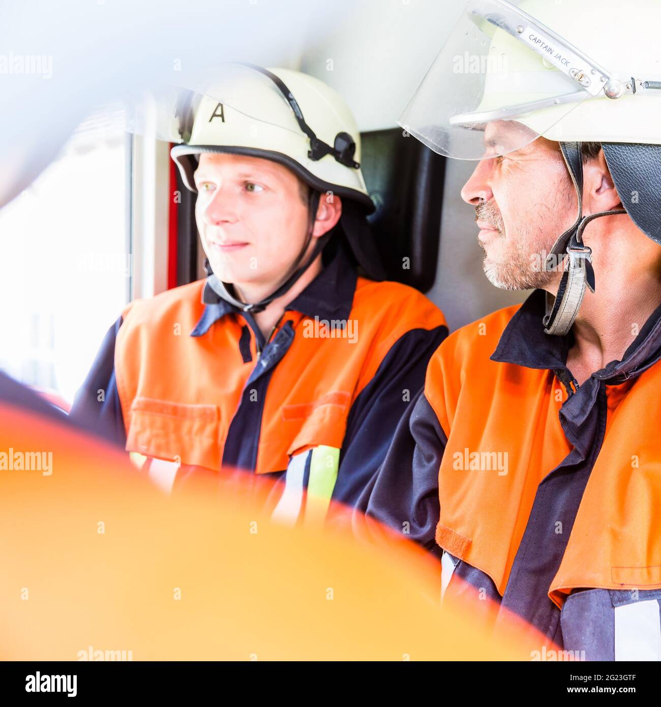 Fire brigade having operation meeting Stock Photo - Alamy