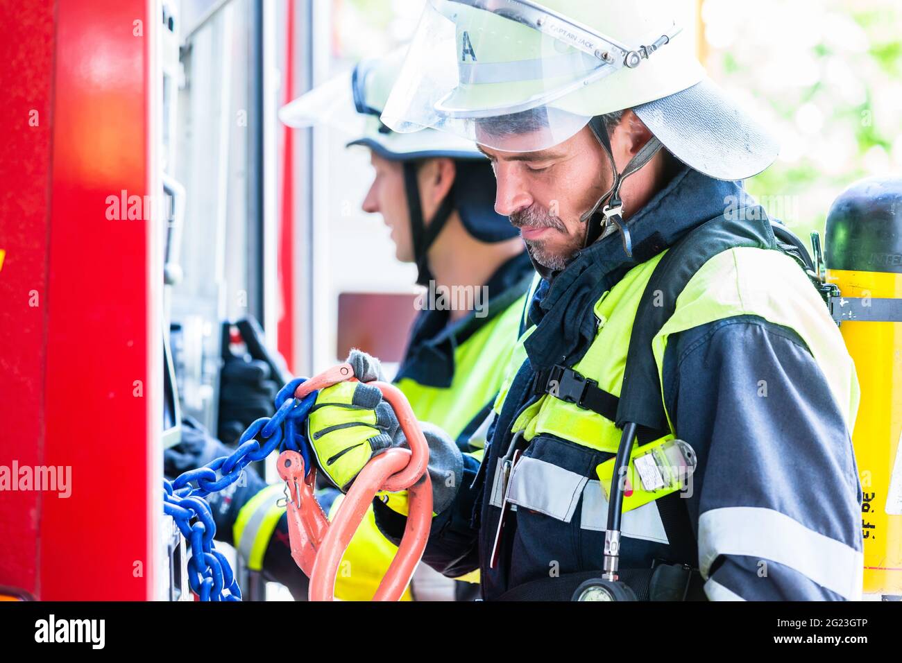 Fire department brigade action water hose hoses hi-res stock ...