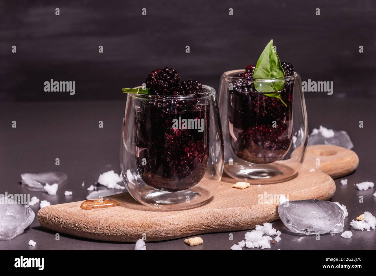 Refreshing blackberry fruit drink. Cold summer berry cocktail, modern ...