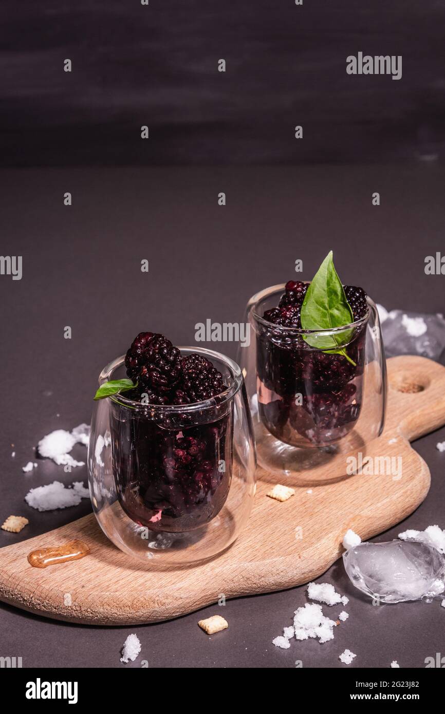 Refreshing blackberry fruit drink. Cold summer berry cocktail, modern ...