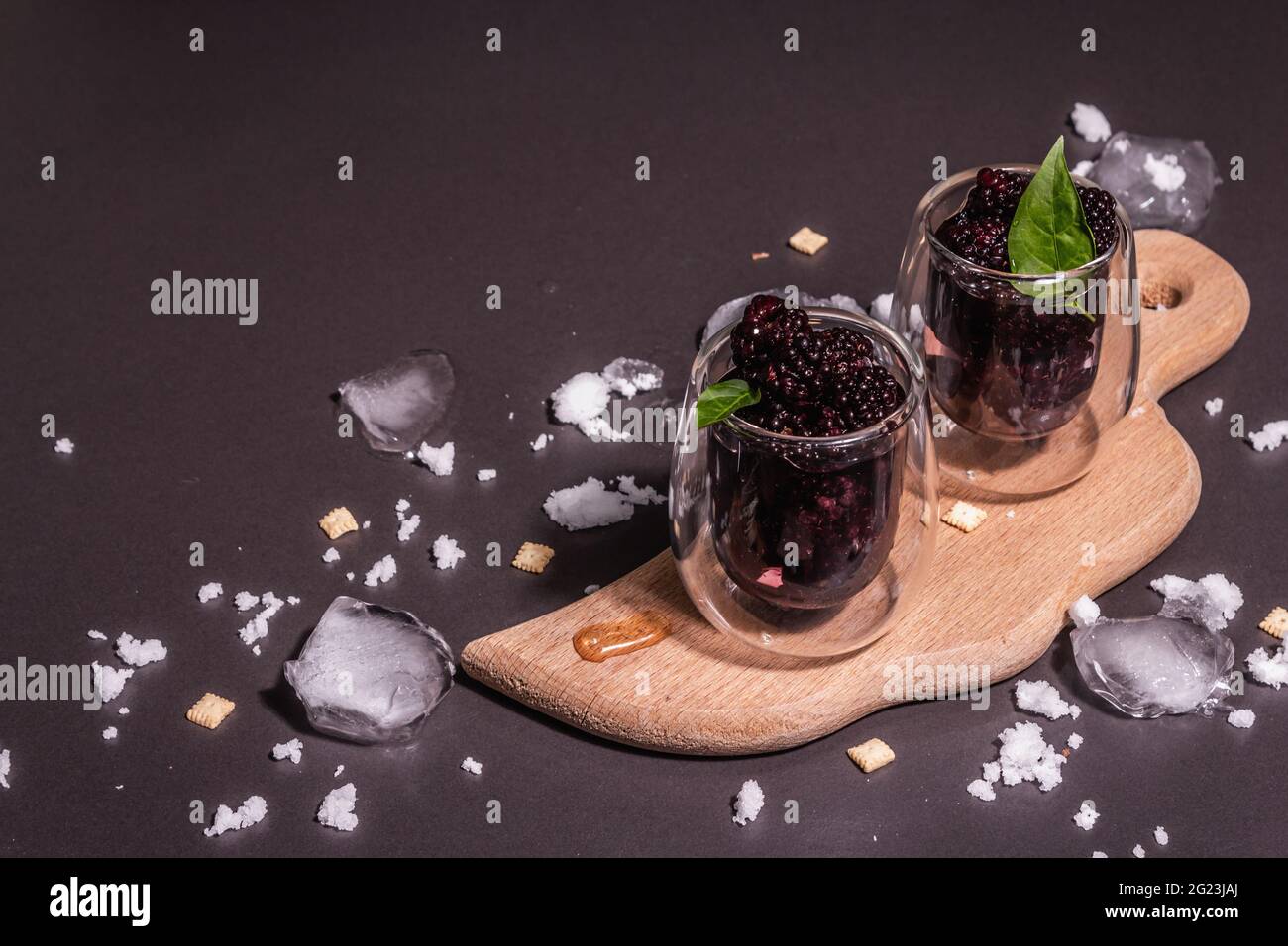 Refreshing blackberry fruit drink. Cold summer berry cocktail, modern ...