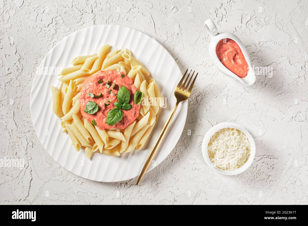 Pink Sauce Pasta, Parma Rosa Sauce with Penne on a plate with golden ...