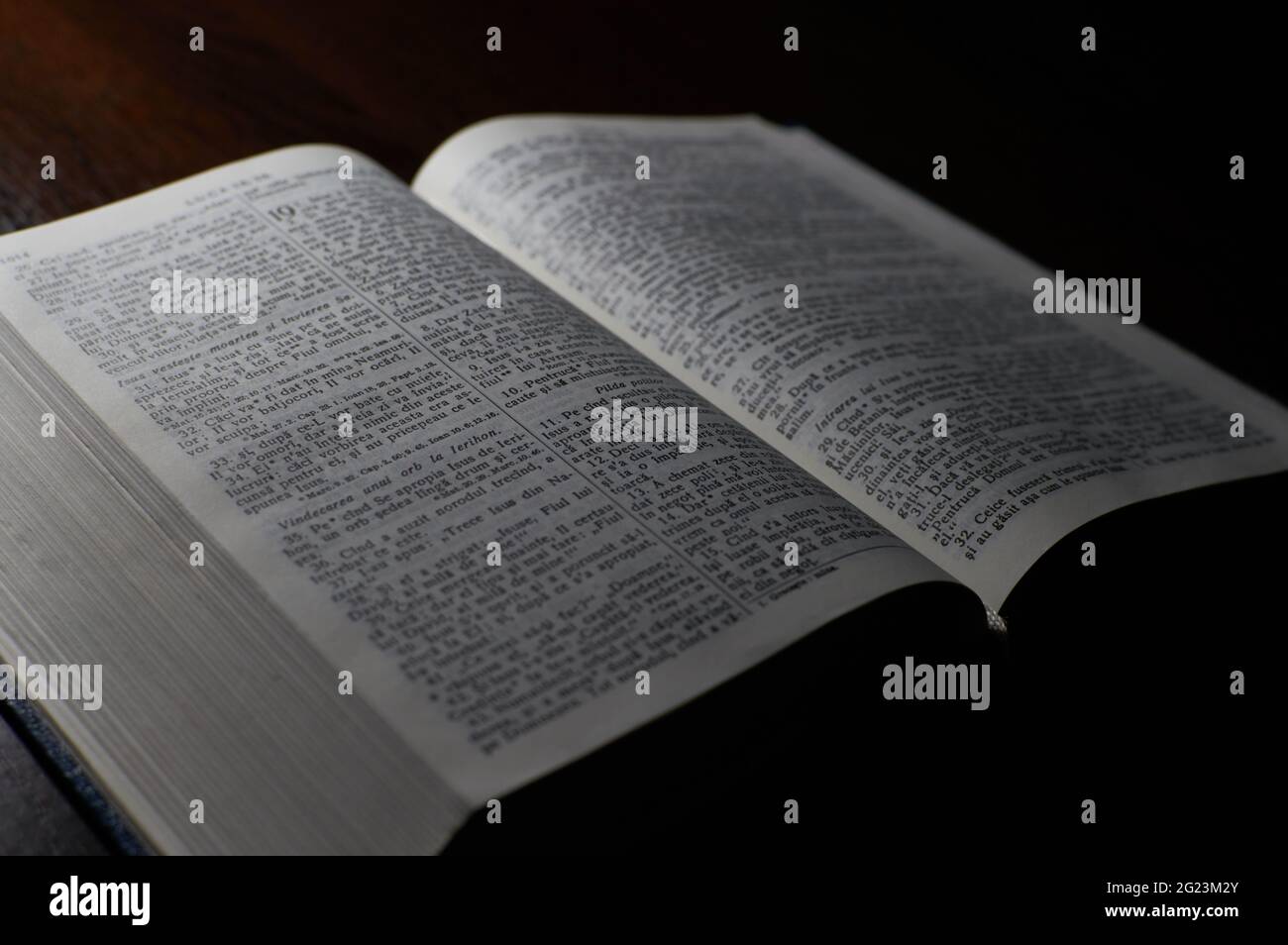 Open christian Bible on a wooden Slate Table Stock Photo - Alamy