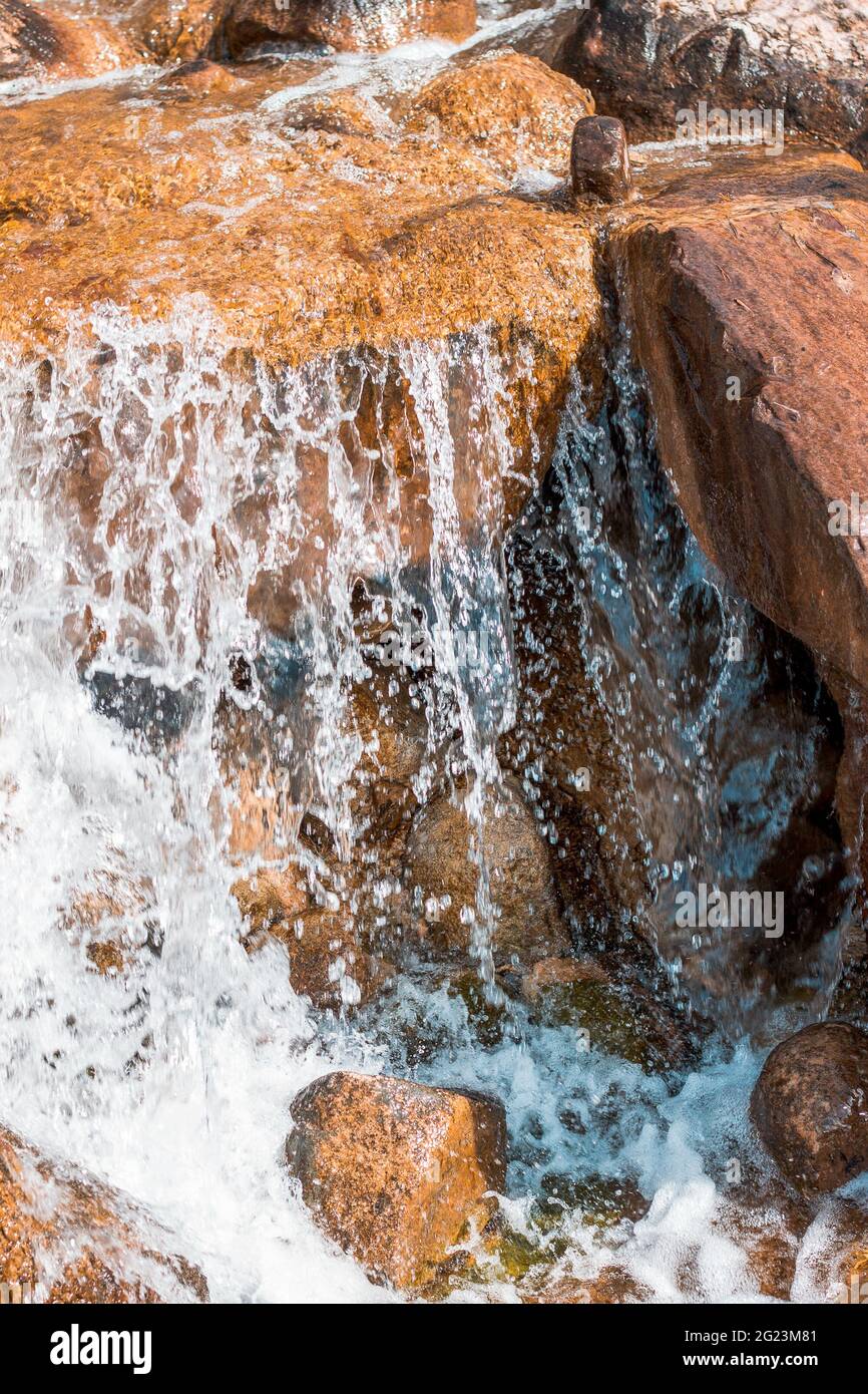 Water rushing down a waterfall Stock Photo - Alamy