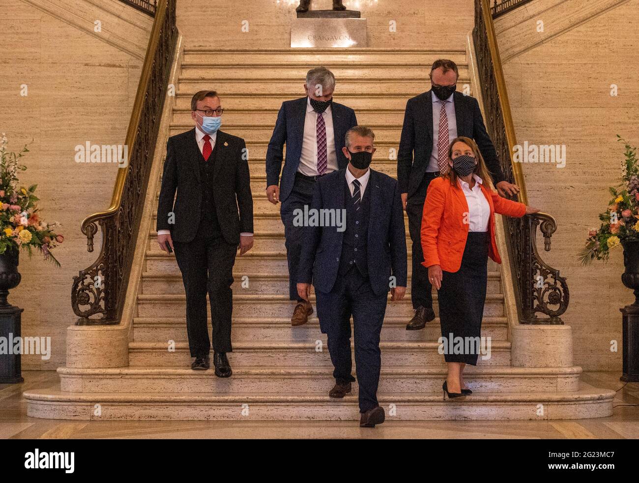 Leader of the DUP Edwin Poots (centre) with (left to right) Christopher ...