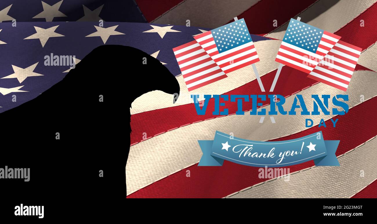 Silhouette of eagle and veterans day text against waving american flag ...