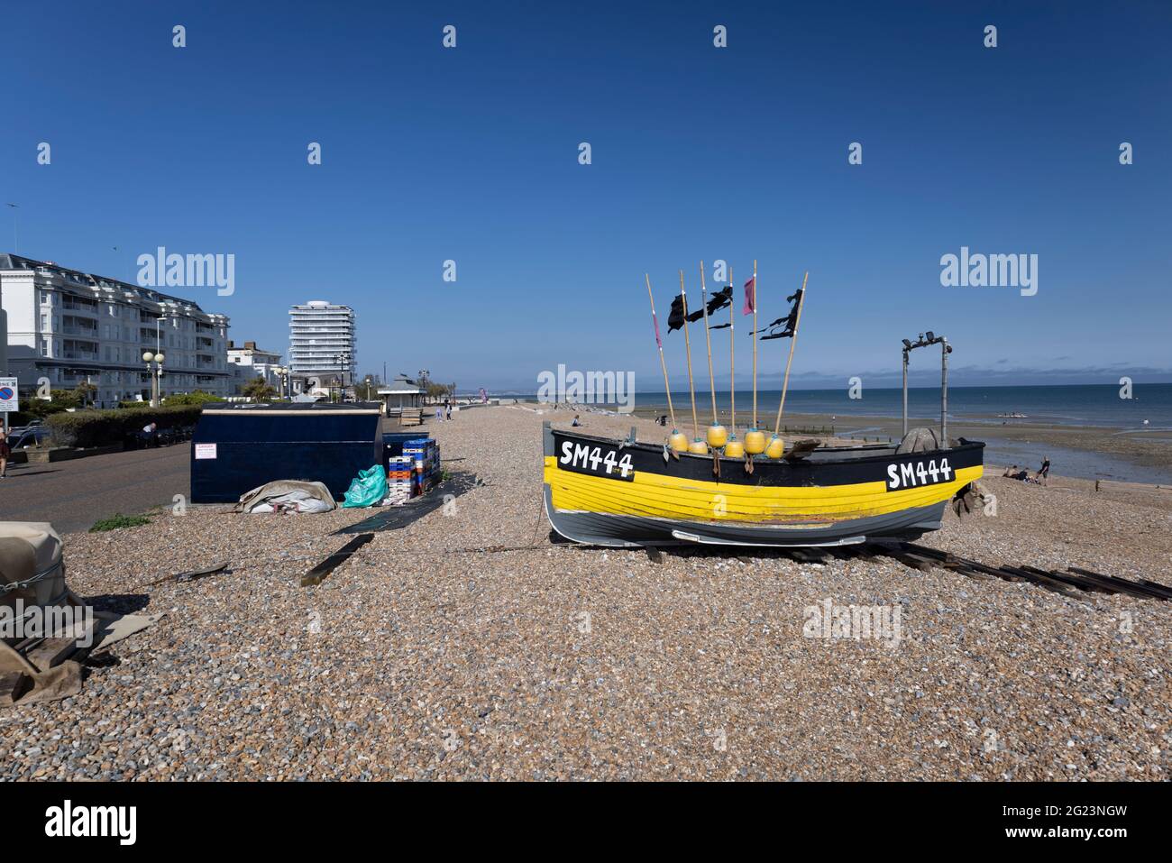 Shoreham registered fishing boat SM444, drawn up on the beach at ...