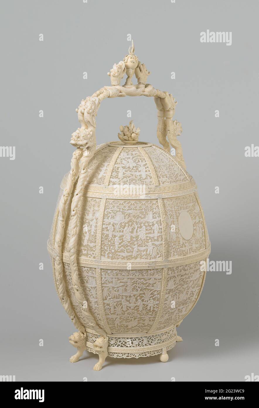 Part of a large ivory stacking box with openwork panels. Part of a ...