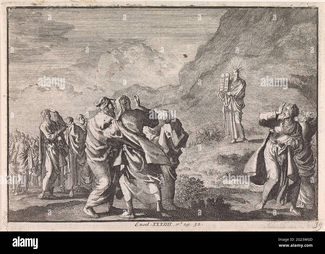 Moses receives the legal tables and shows them to the people Stock ...