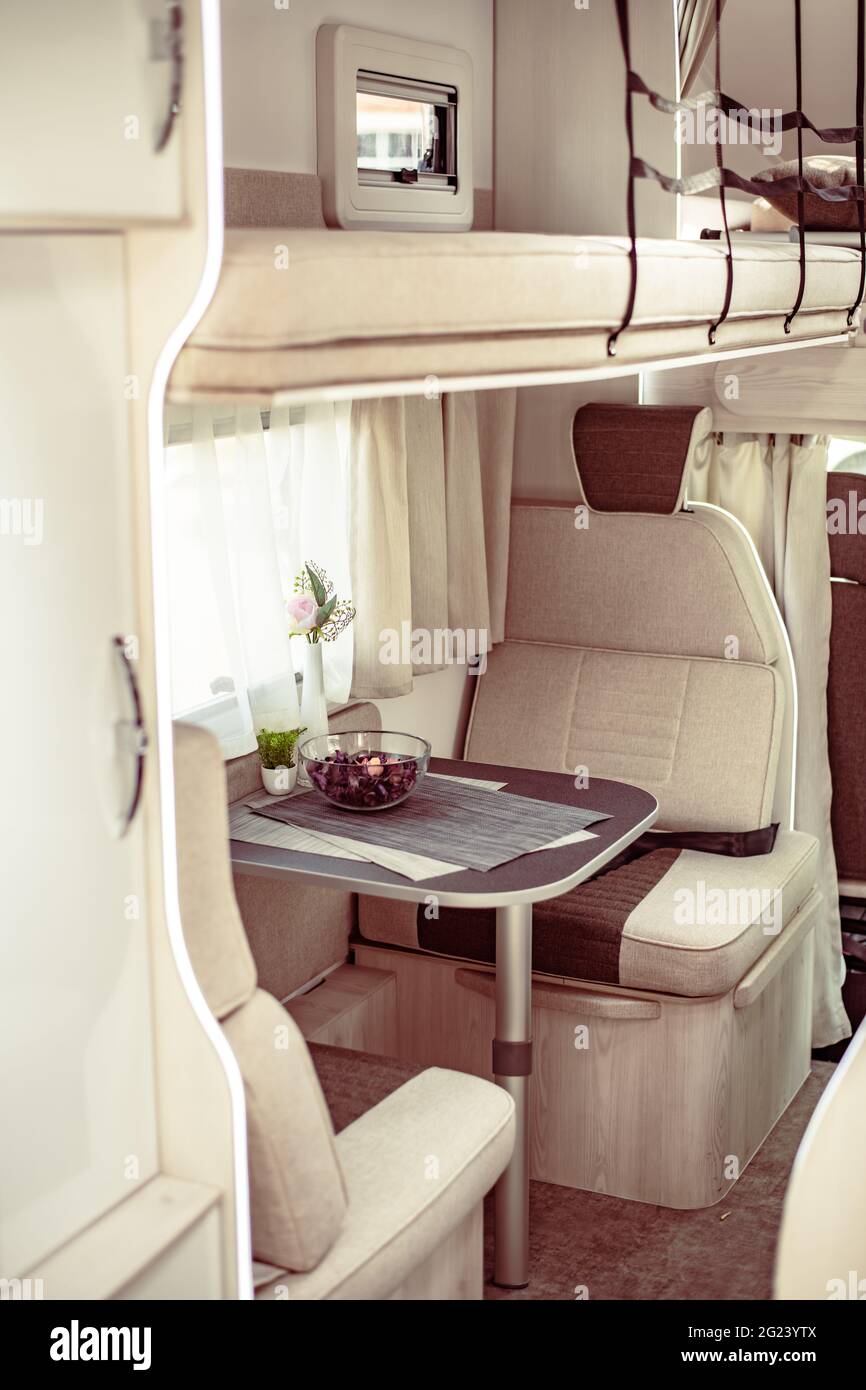 Trailer or car house on wheels in an mobile home. Interior inside table ...