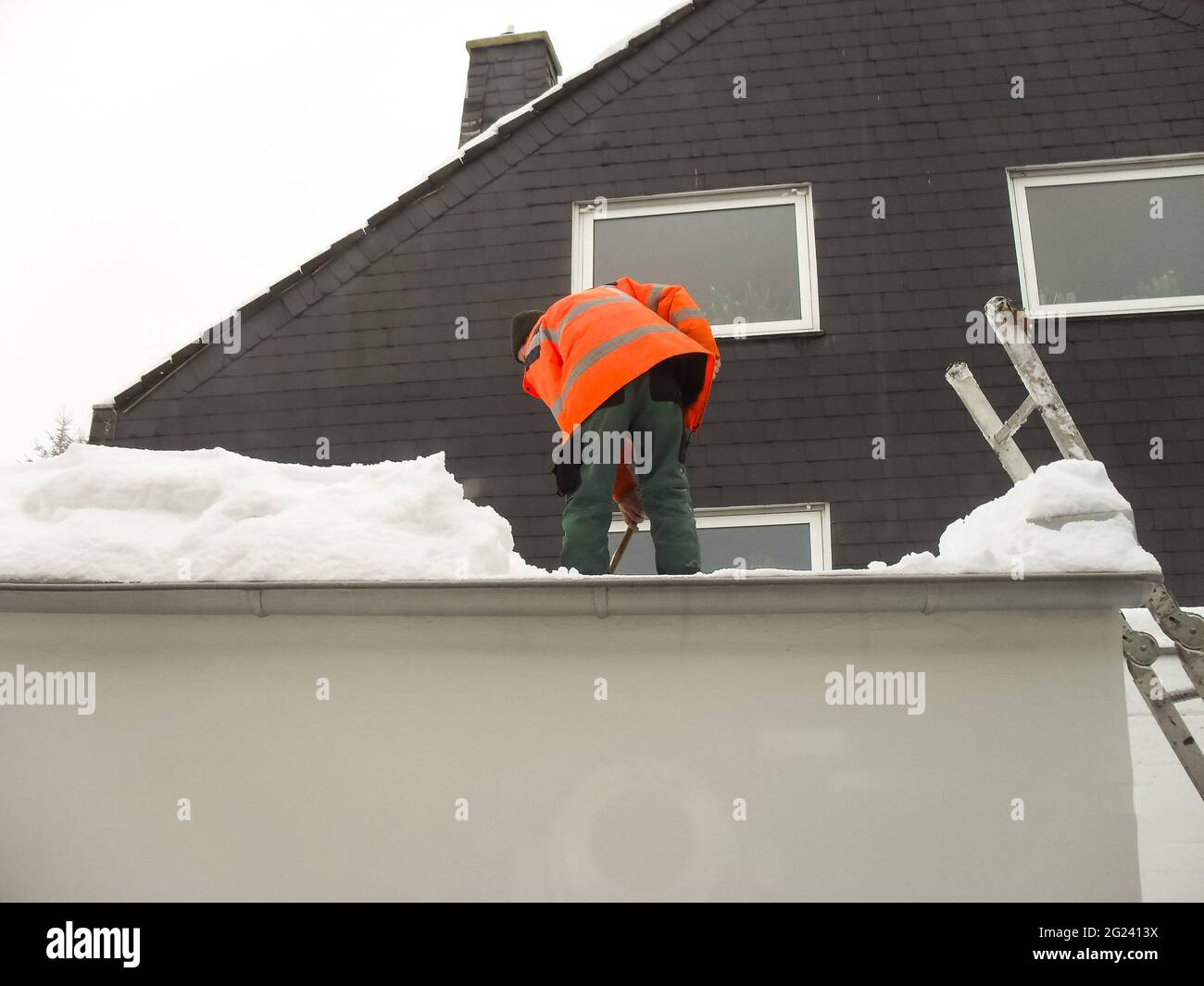 Remove snow from a heavy snowfall hi-res stock photography and images ...