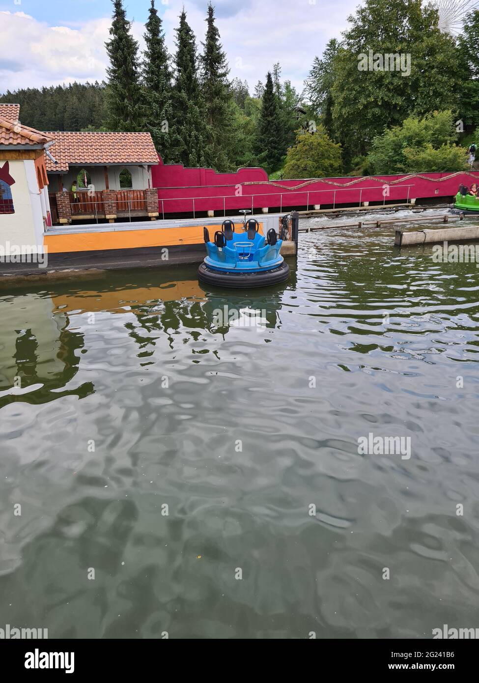 Exciting ride on the raging river of a wild water ride Stock Photo - Alamy