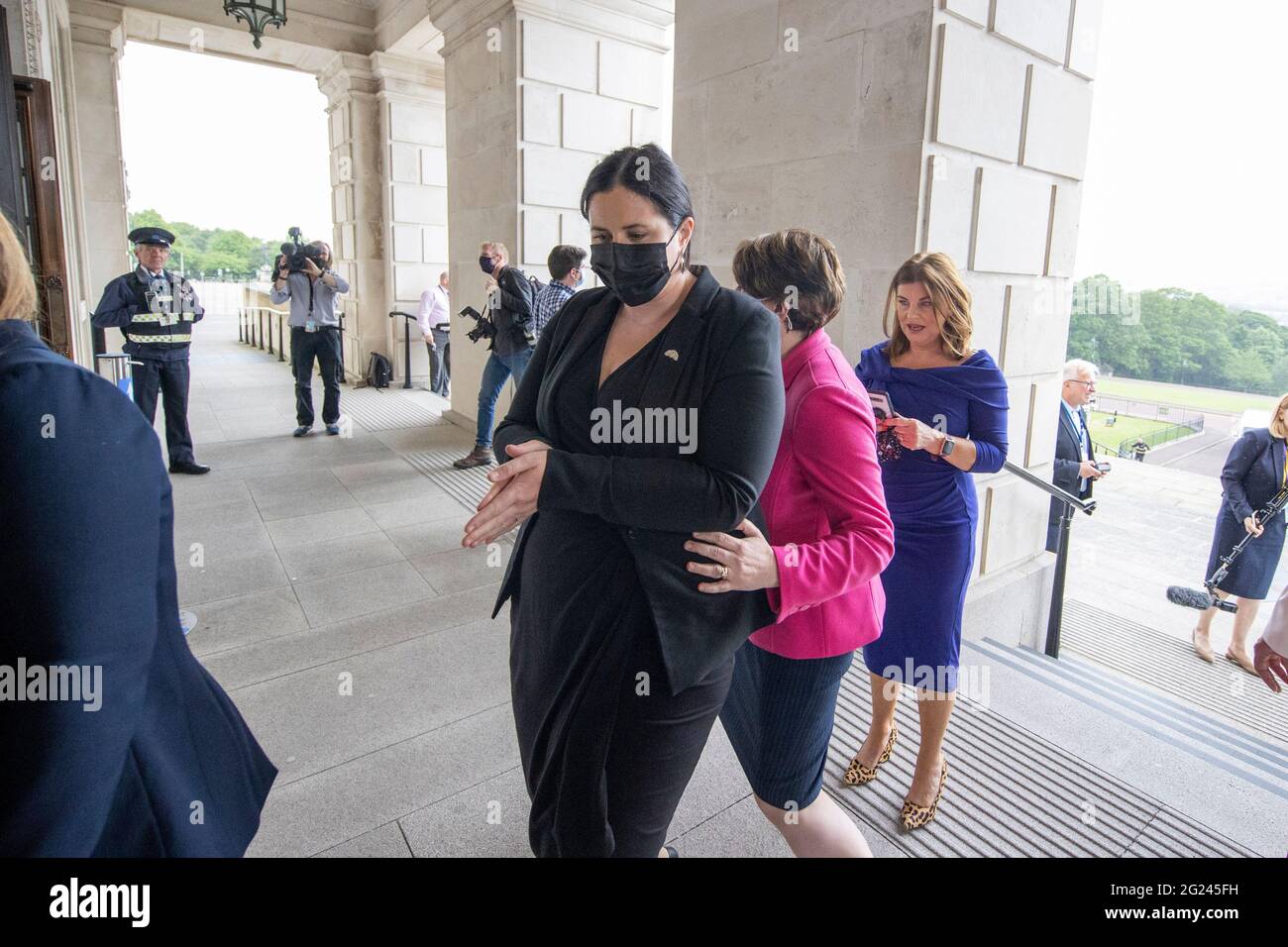 First Minister Arlene Foster (centre) steps between Independent MLA ...