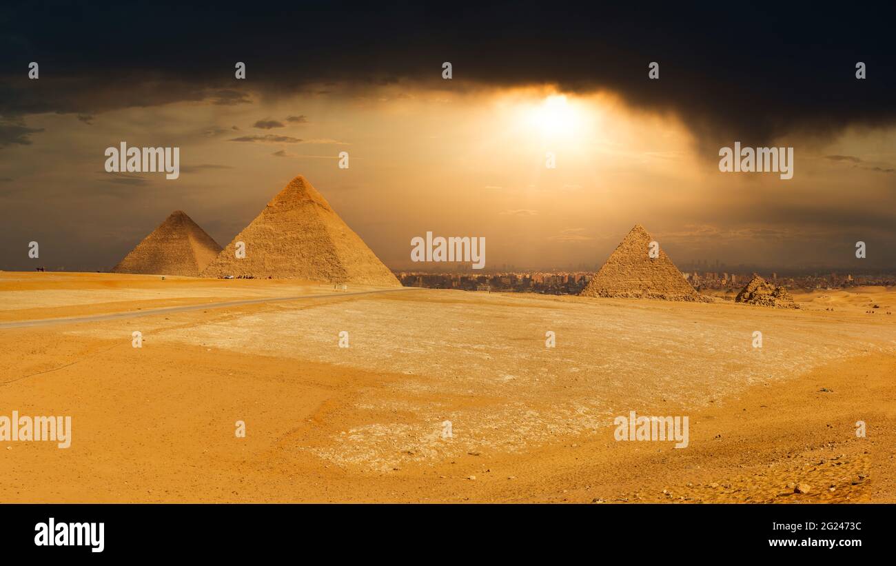 The famous pyramids at Giza in Egypt with a dark dramatic sky Stock ...