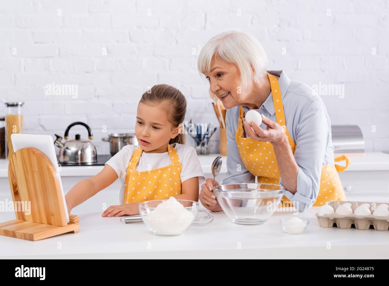 Smiling granny kid using hi-res stock photography and images - Alamy