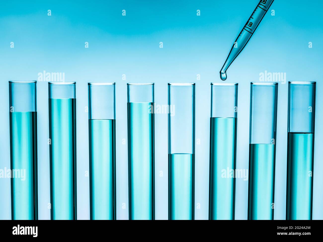 Pipette dropping liquid in hi-res stock photography and images - Alamy