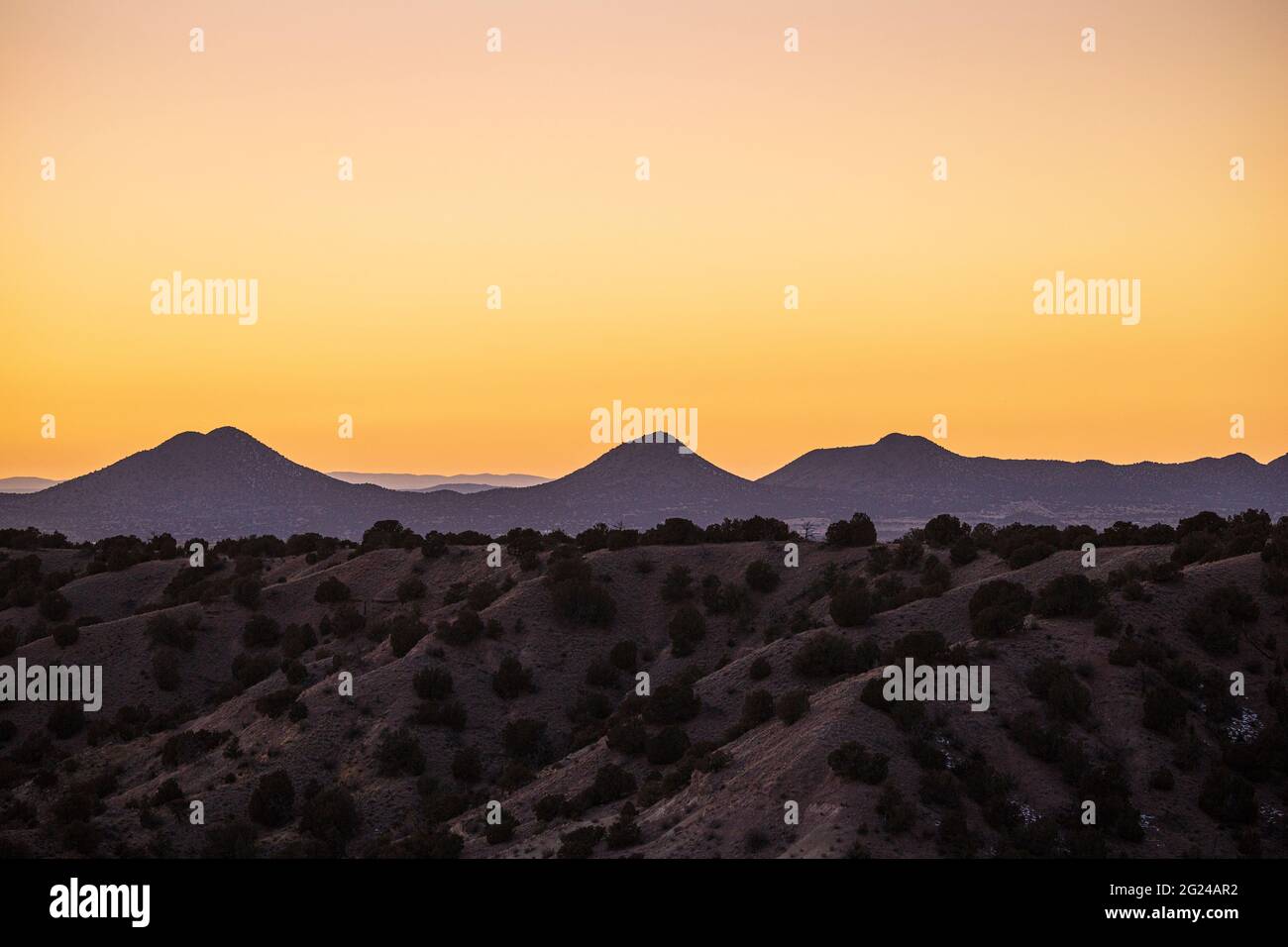 COLORFUL SKY OVER THE CERRILLOS HILLS FROM GALISTEO BASIN PRESERVE ...