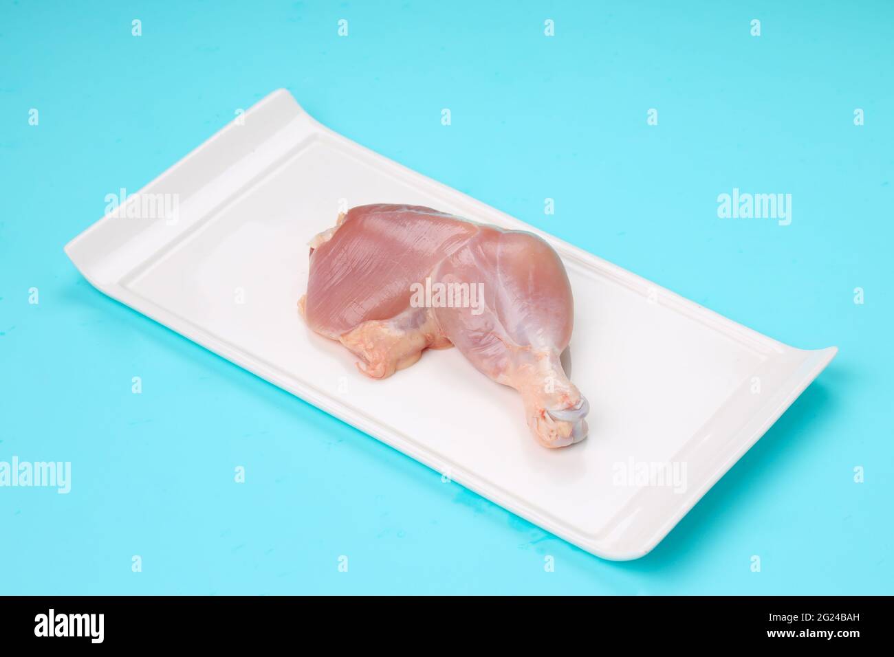 Raw whole chicken leg without skin arranged rectangle shape flat ...