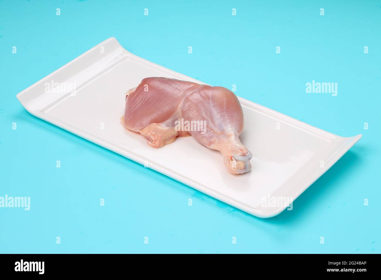 Raw whole chicken leg without skin arranged rectangle shape flat ...
