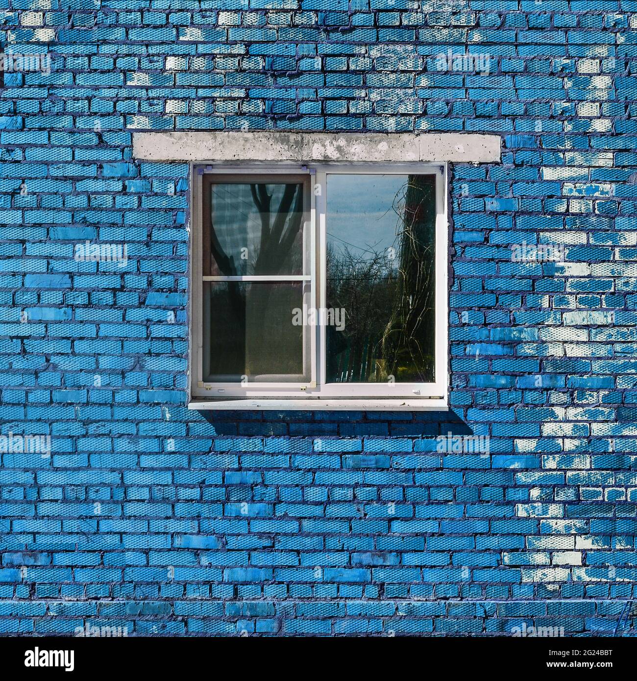 Blue brick wall and window. Brick building. Old brickwork Stock Photo ...