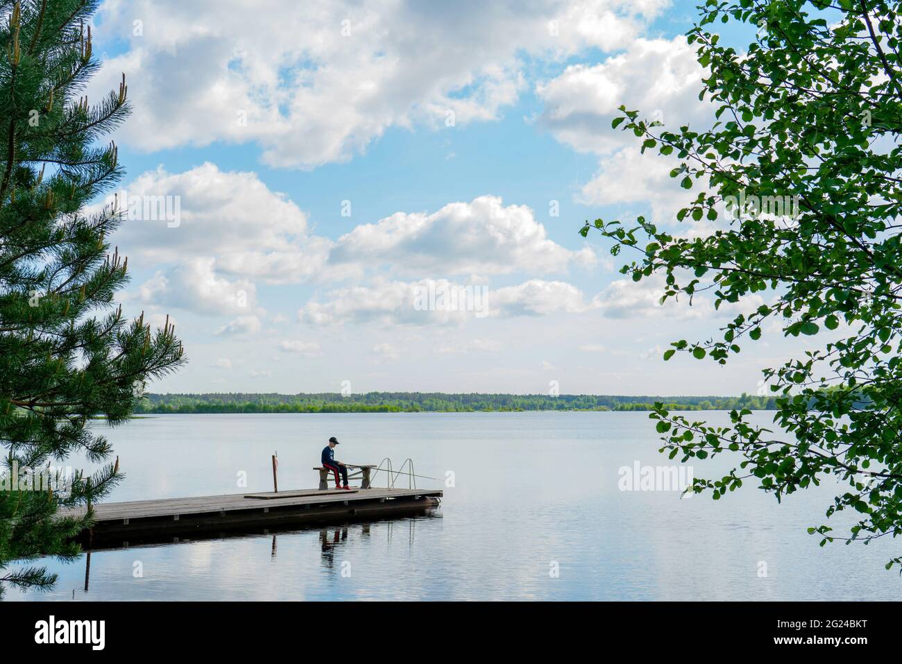 VOLGA, RUSSIA - Jun 08, 2021: Volga river, Russia, May 28, 2021. A boy ...