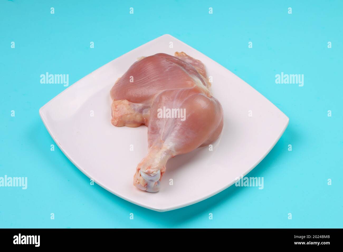 Raw whole chicken leg without skin arranged in a square shape white ...