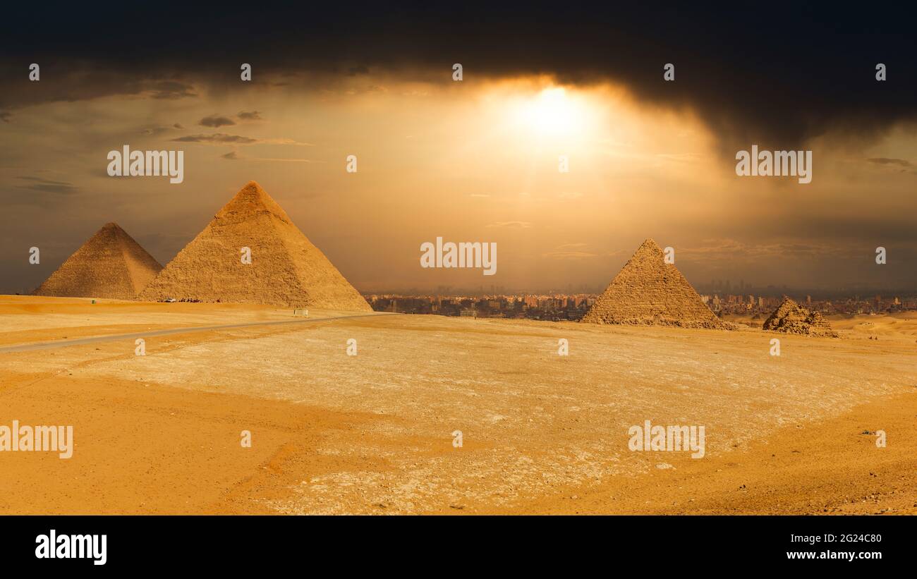 The famous pyramids at Giza in Egypt with a dark dramatic sky Stock ...