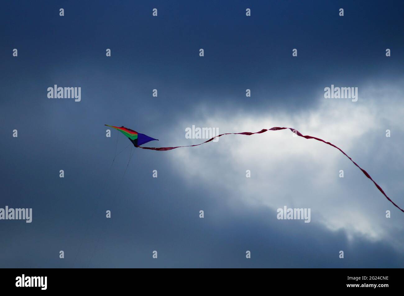 Stormy sky flying kite hi-res stock photography and images - Alamy