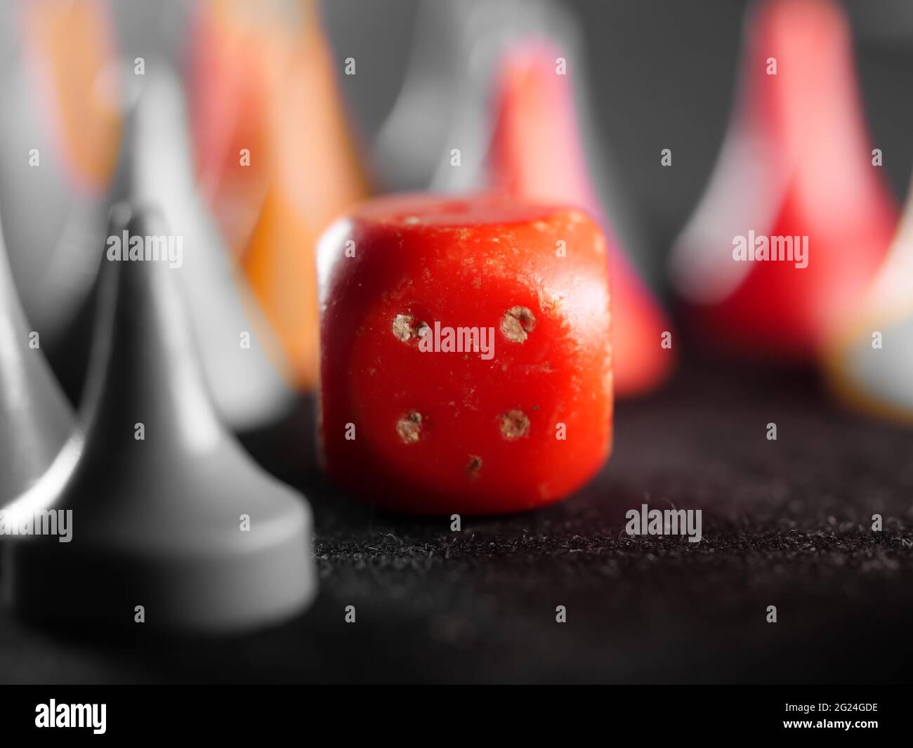 Red dice for board games on the table Stock Photo - Alamy