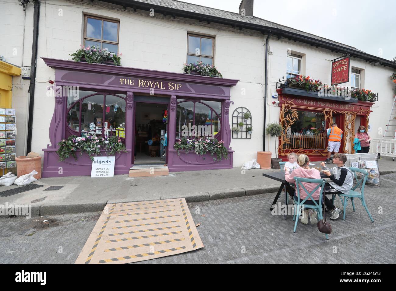 Shop in Enniskerry village in County Wicklow, Ireland, are transformed ...