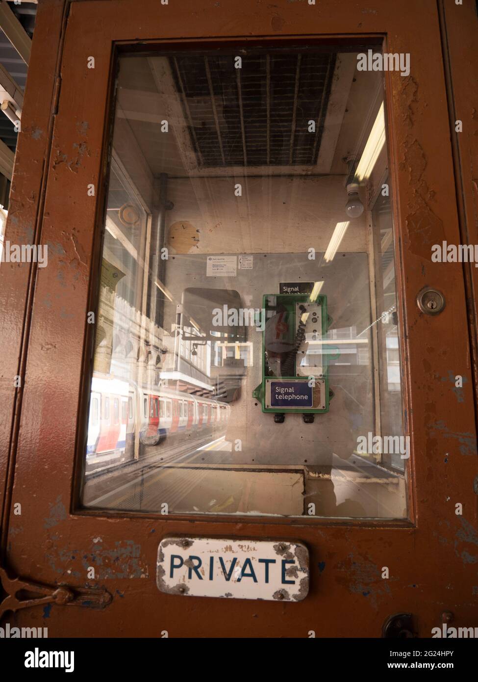 Signal telephone at London underground tube station Stock Photo - Alamy