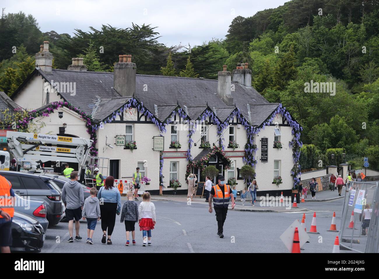 Local people carry on with daily life whilst workers transform ...