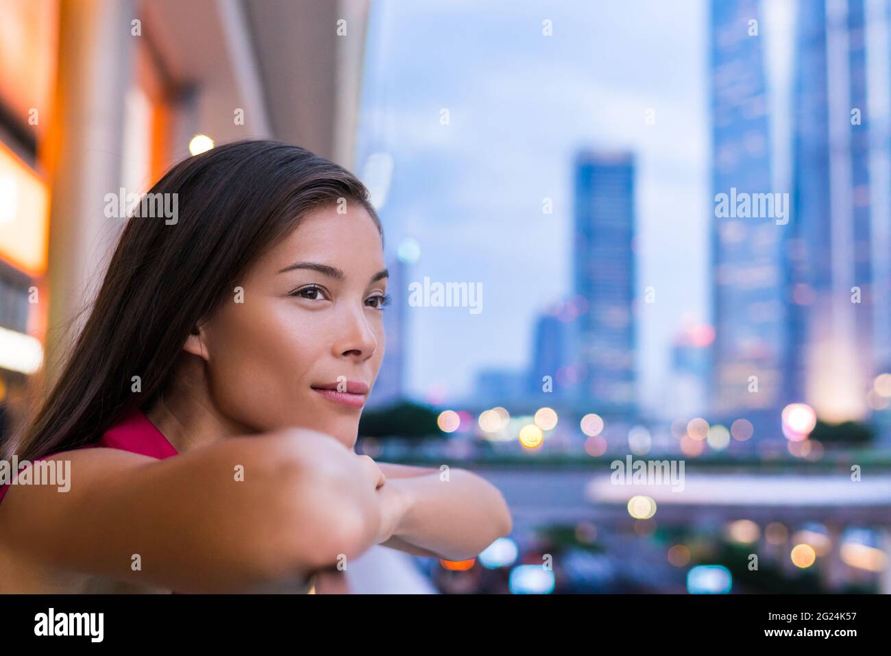 Shanghai city urban Asian woman pensive relaxing Stock Photo - Alamy