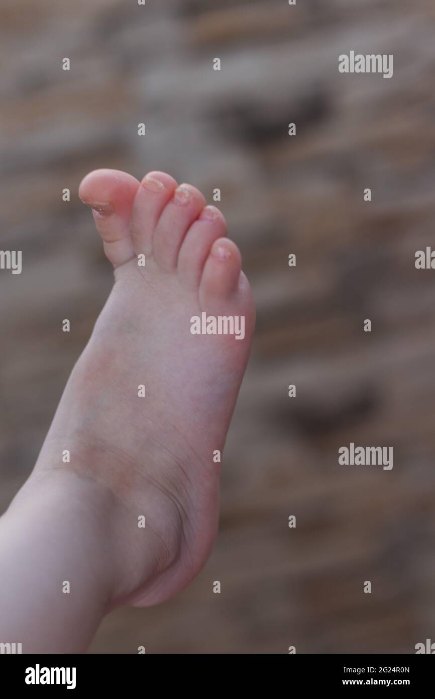 Childs feet portrait hi-res stock photography and images - Alamy