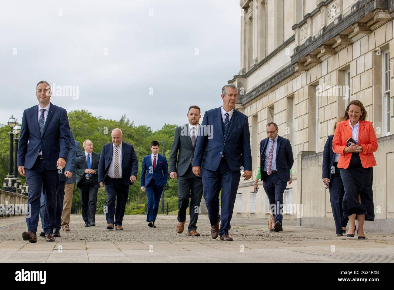 DUP leader Edwin Poots (centre) walking with deputy leader Paula ...