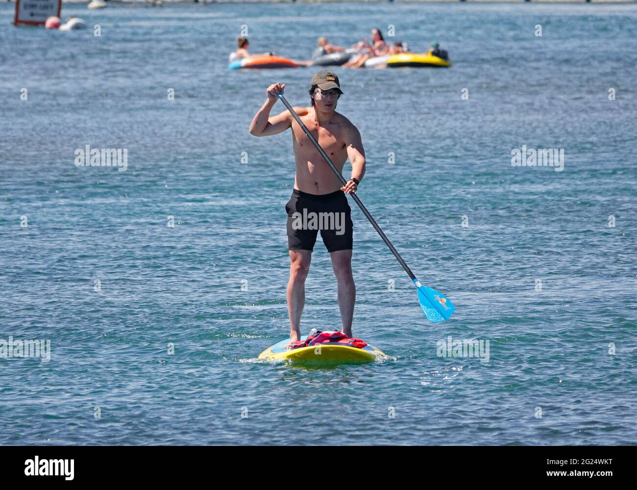 In warm summer weather paddleboarders, kayakers, rafters and floaters ...
