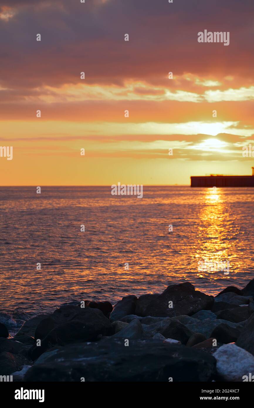 Beautiful sunset on sea coast hi-res stock photography and images - Alamy