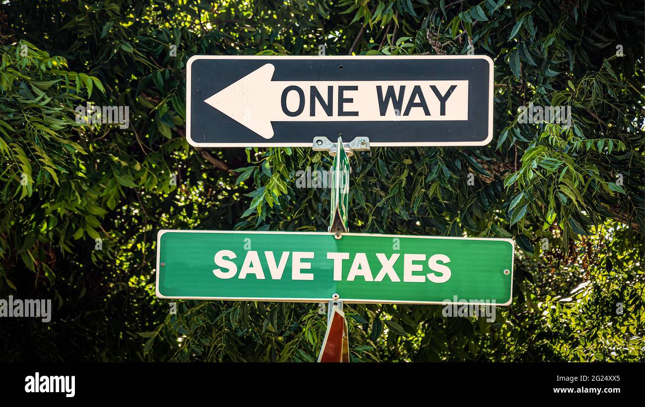 Street Sign the Direction Way to Save Taxes Stock Photo - Alamy