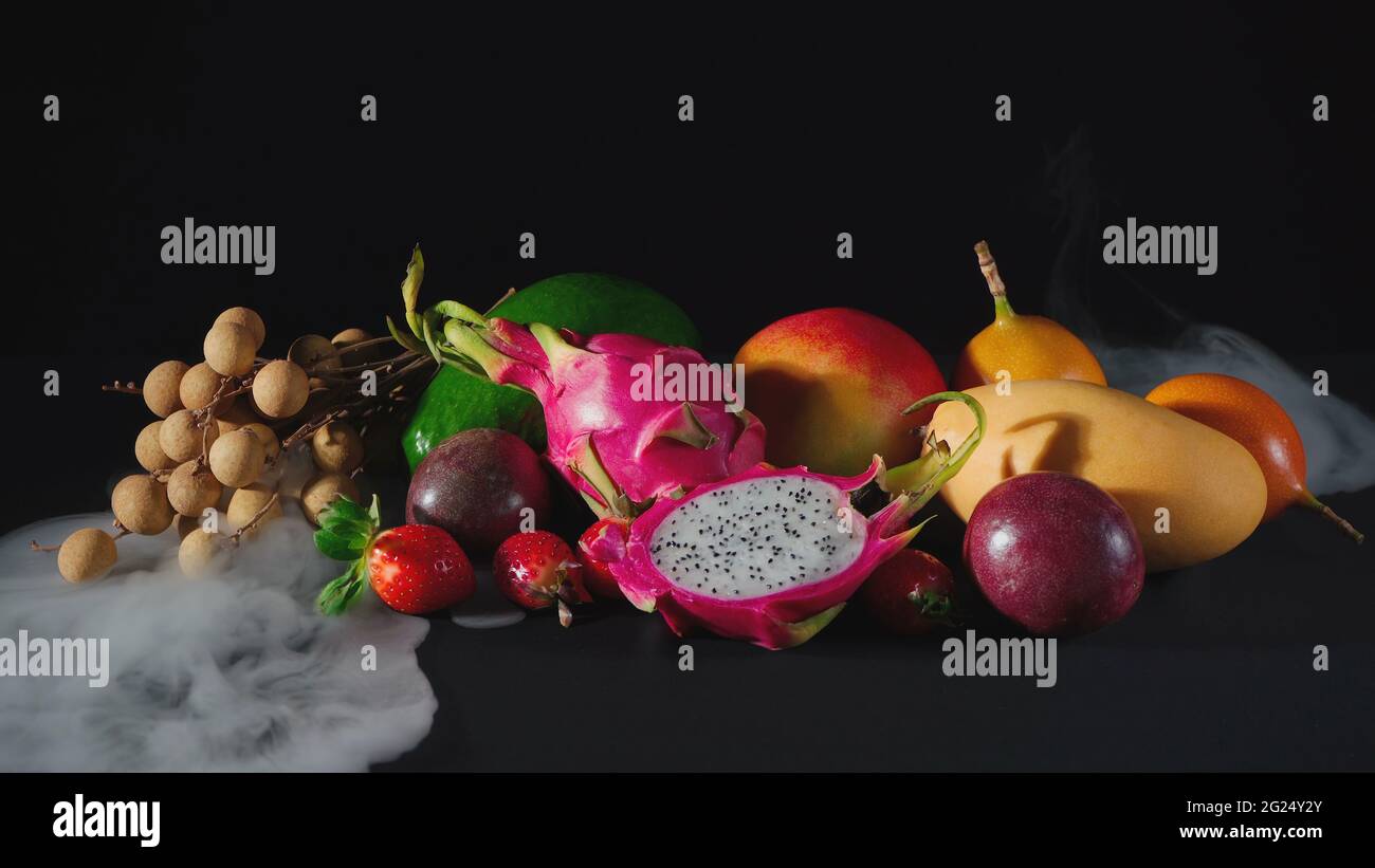 Exotic fruits in white smoke hi-res stock photography and images - Alamy