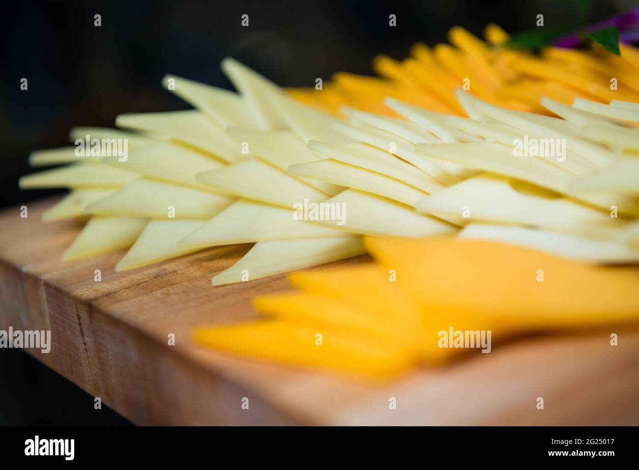 Orange and yellow cheese spread. Close up Stock Photo - Alamy