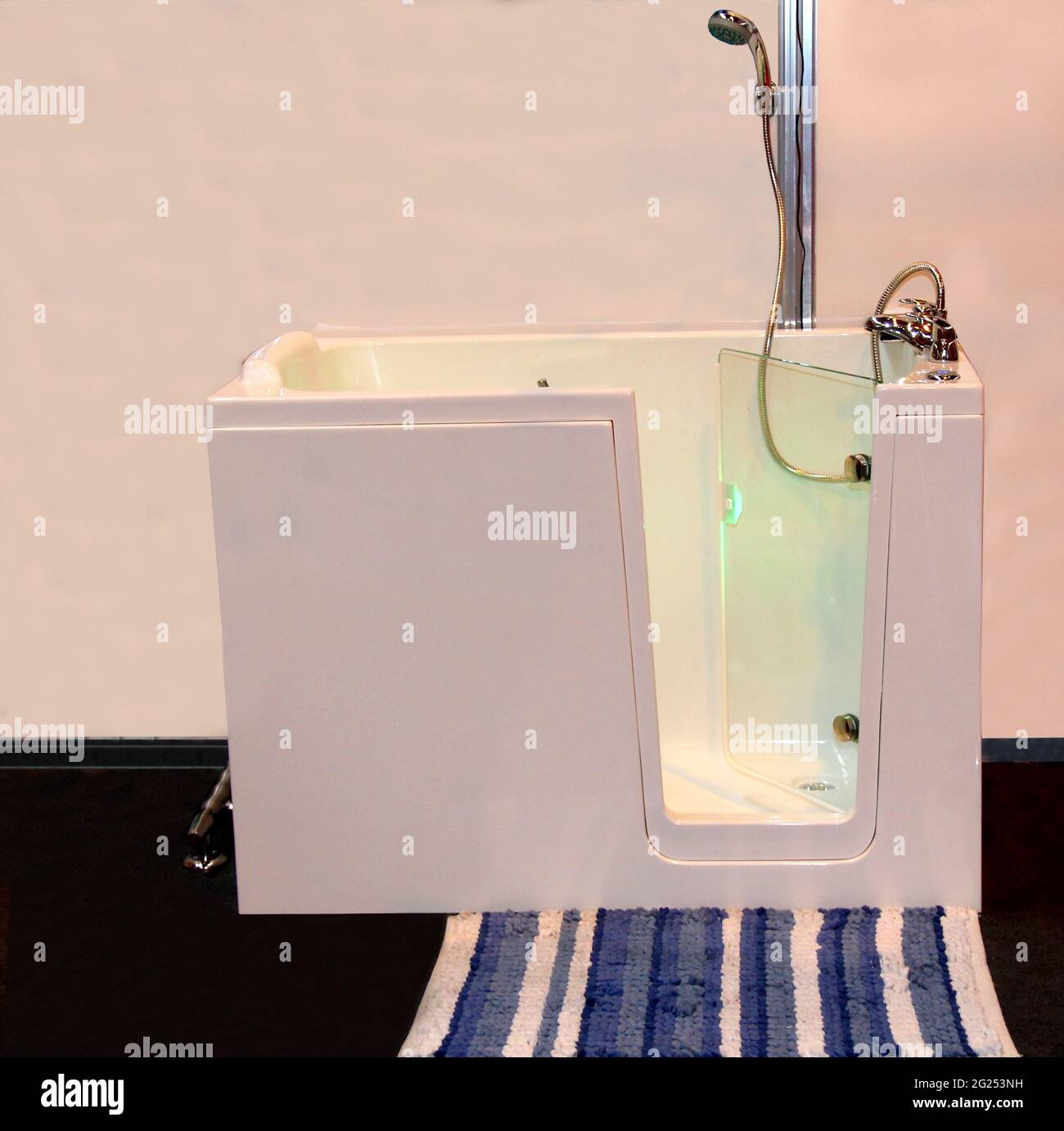 A Walk in Shower Bath with a Glass Access Door Stock Photo - Alamy