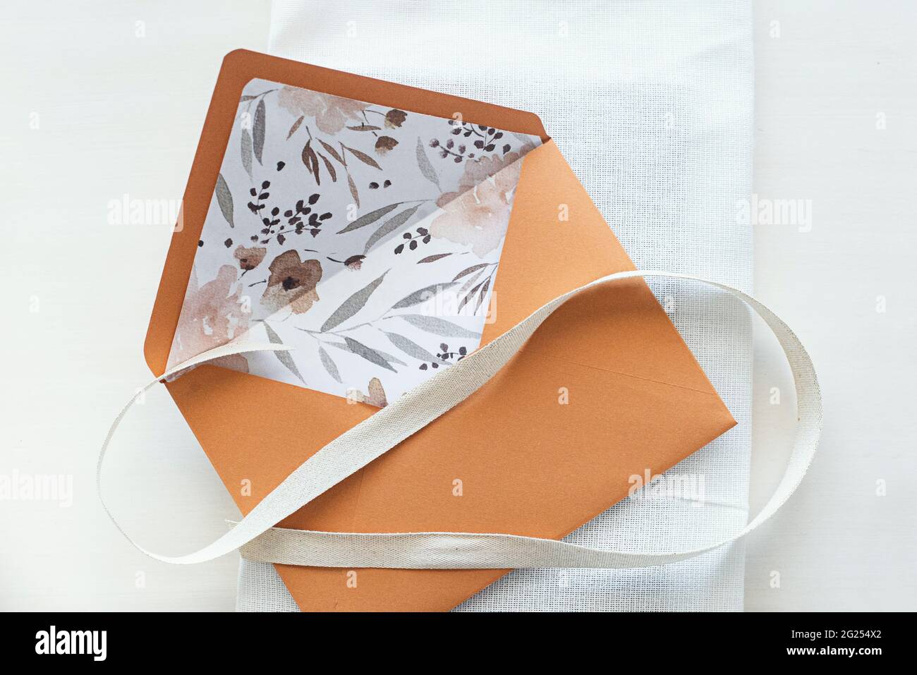 Envelope with ribbon hi-res stock photography and images - Alamy