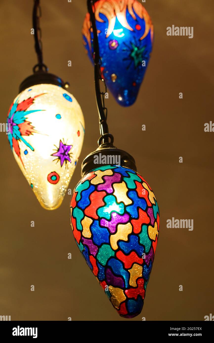 Colorful lamps hanging on the ceiling Stock Photo - Alamy