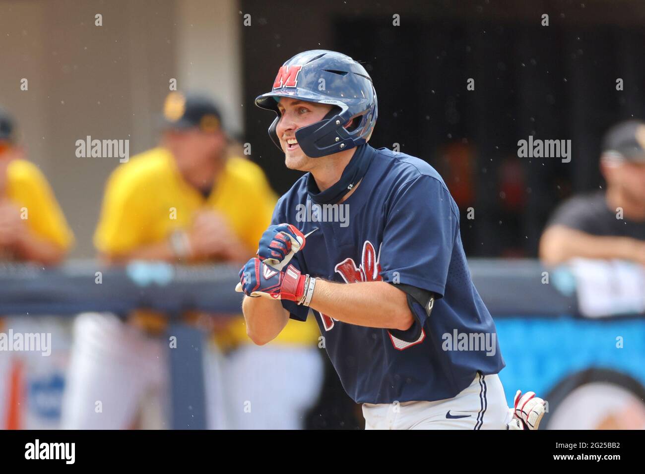 June 07, 2021: Ole Miss infielder Justin Bench (8) heads to home plate ...